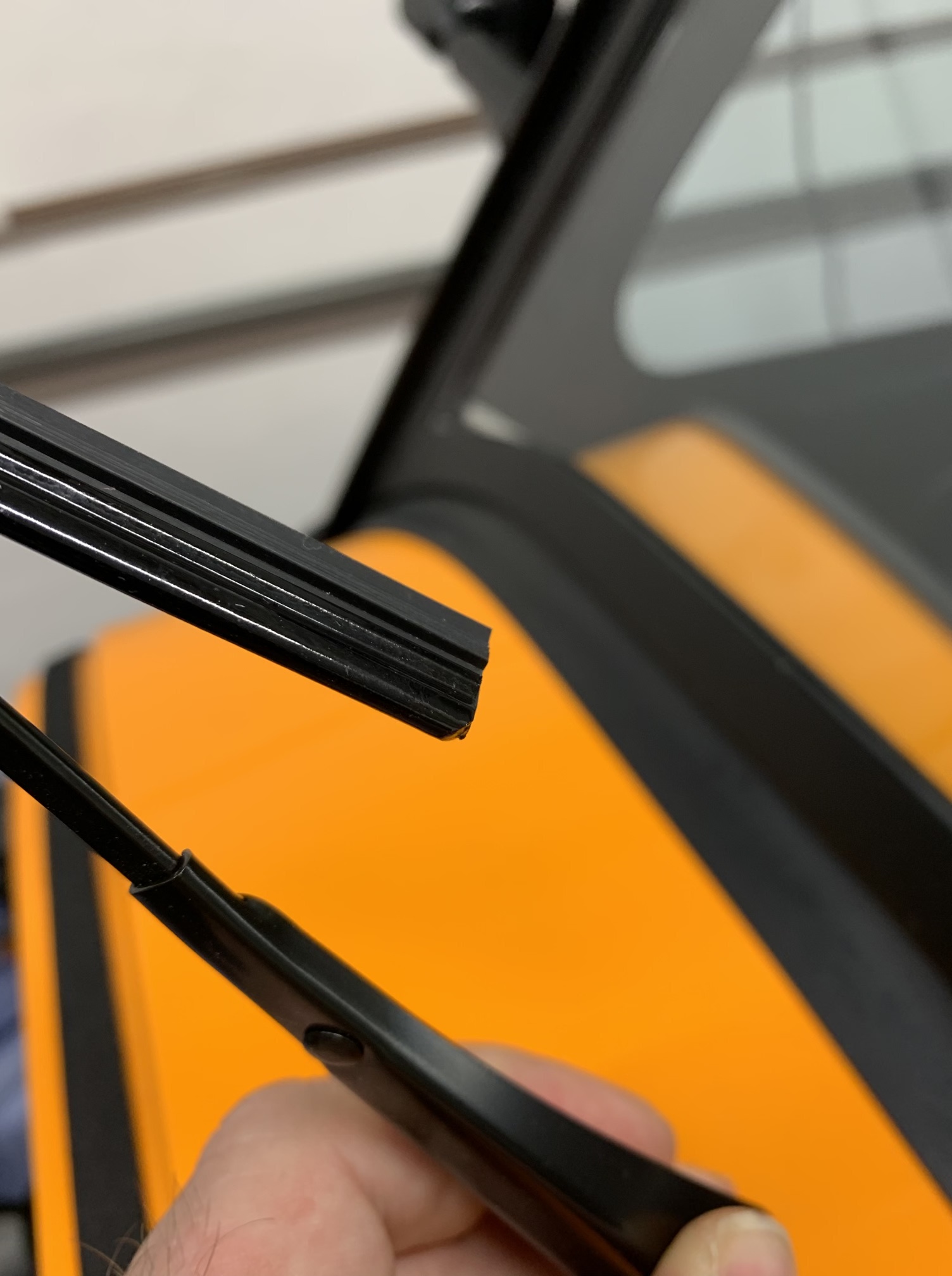 Wiper arms and blades